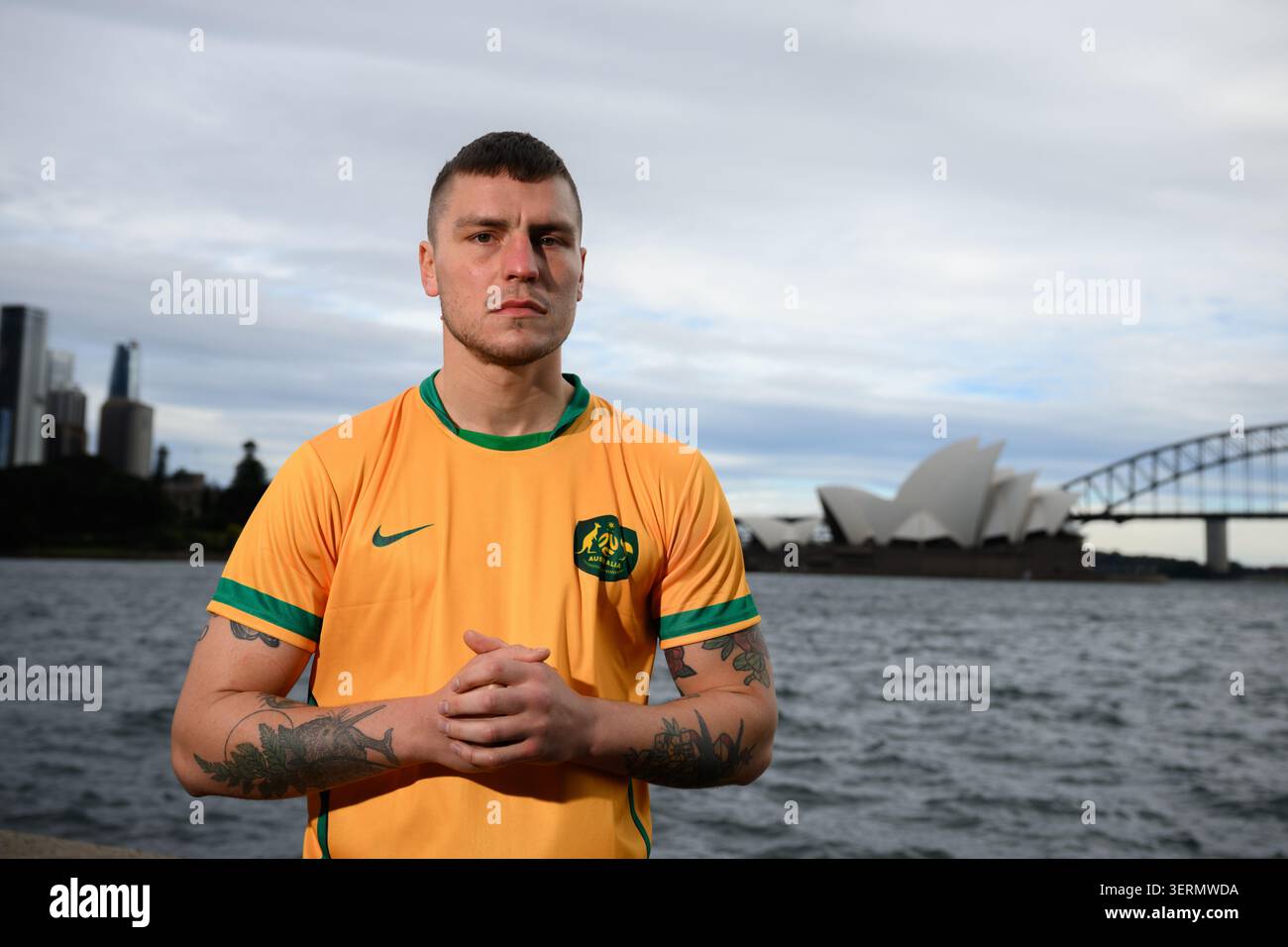 Australian boxer Koen Mazoudier poses for photographs during a press ...