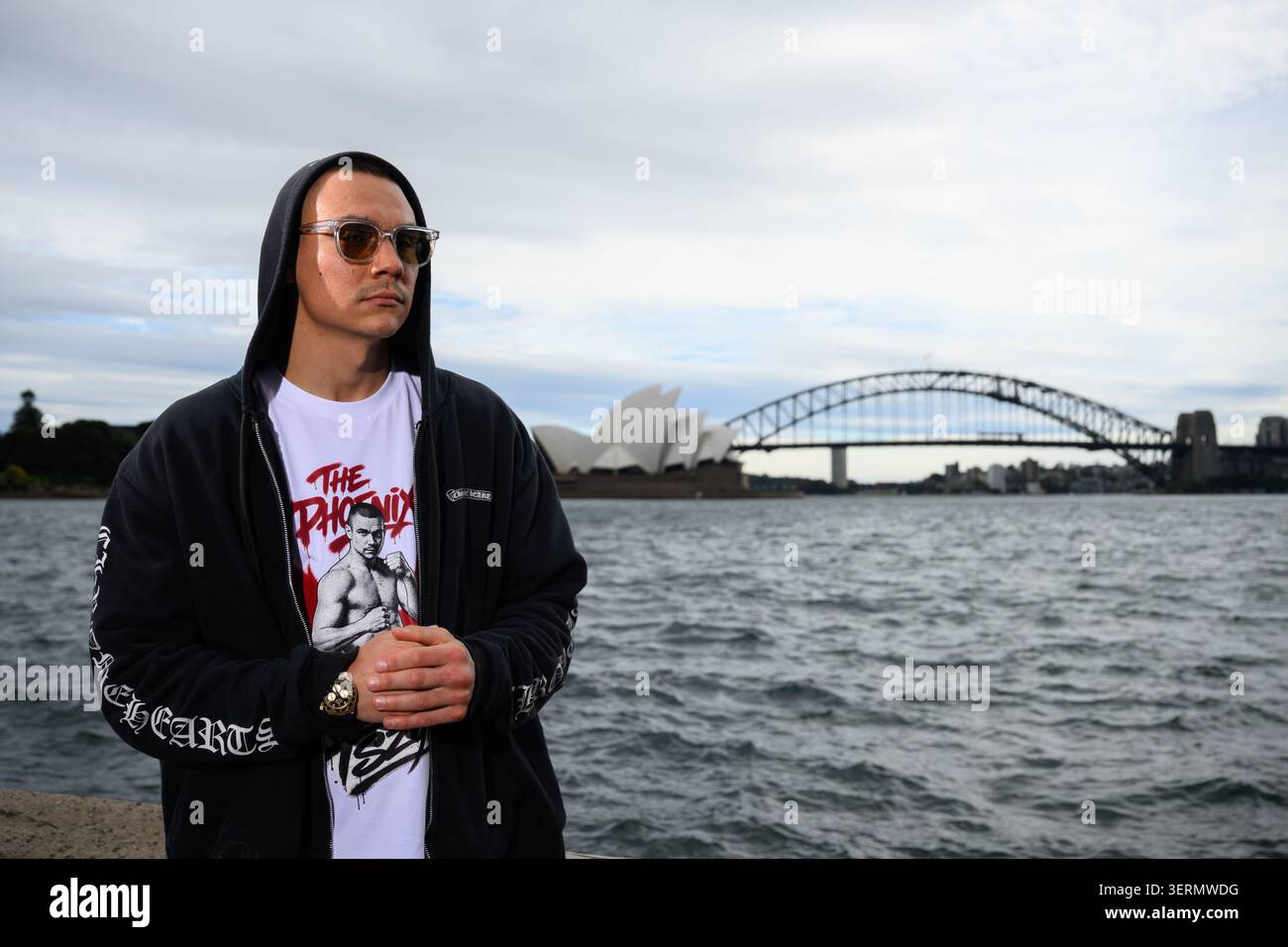 Australian boxer Tim Tszyu poses for photographs during a press ...