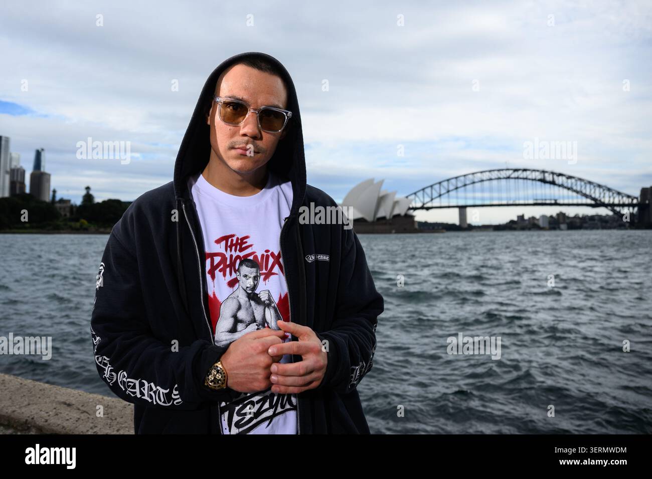 Australian boxer Tim Tszyu poses for photographs during a press ...