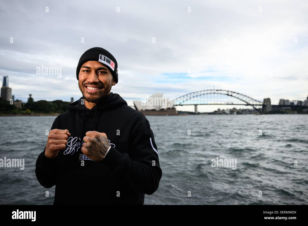 Australian boxer Paulo Aokuso poses for photographs during a press ...