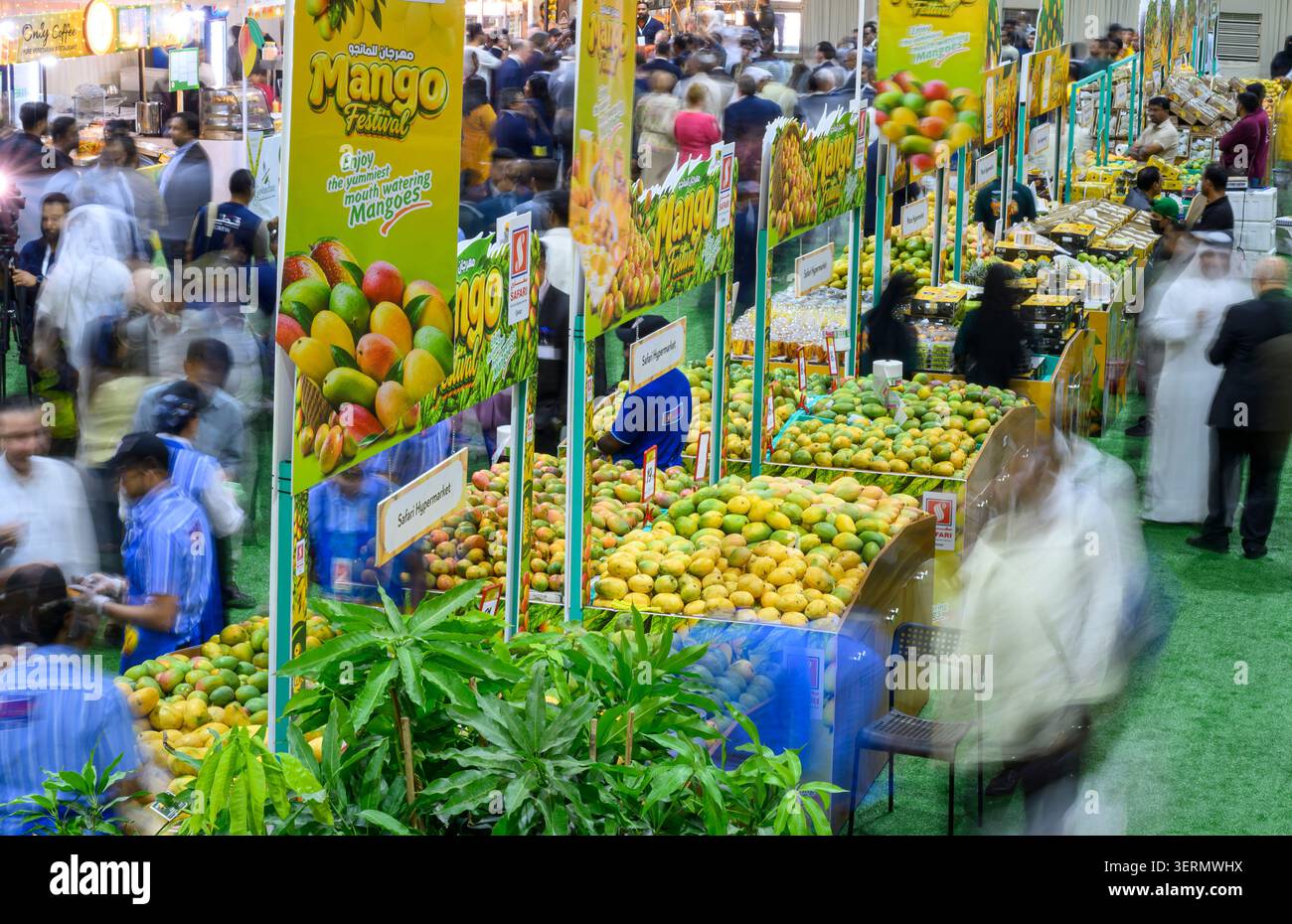 Visitors attend the 3rd Indian Mango Festival at Souq Waqif. The ...