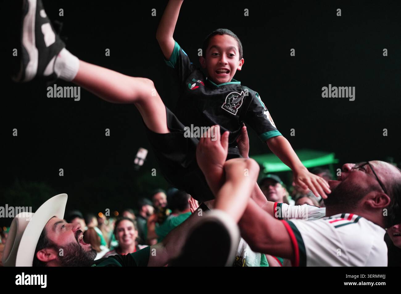 Fans celebrate in a fan zone in Monterrey, Mexico, after Mexico ...