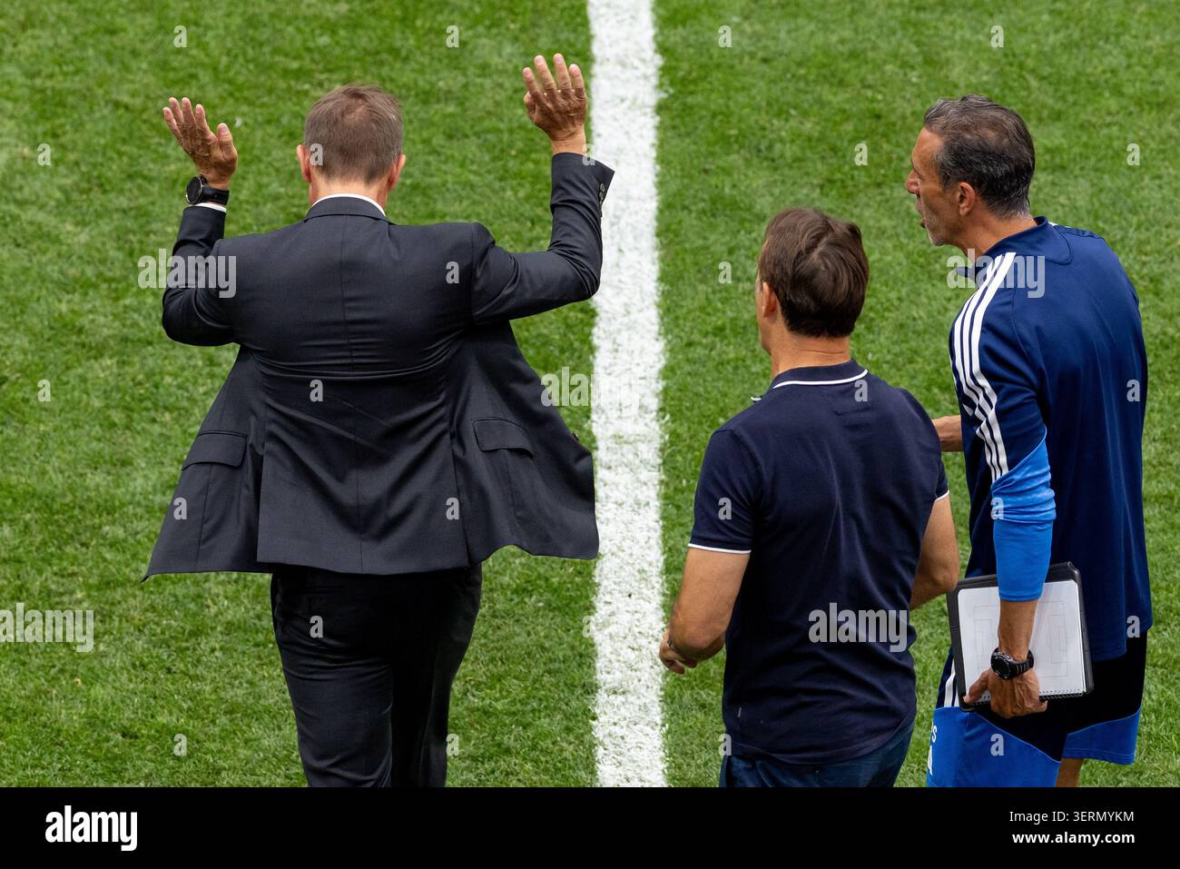 Canada's manager Jesse Marsch walks away from Qatar's manager Julen ...