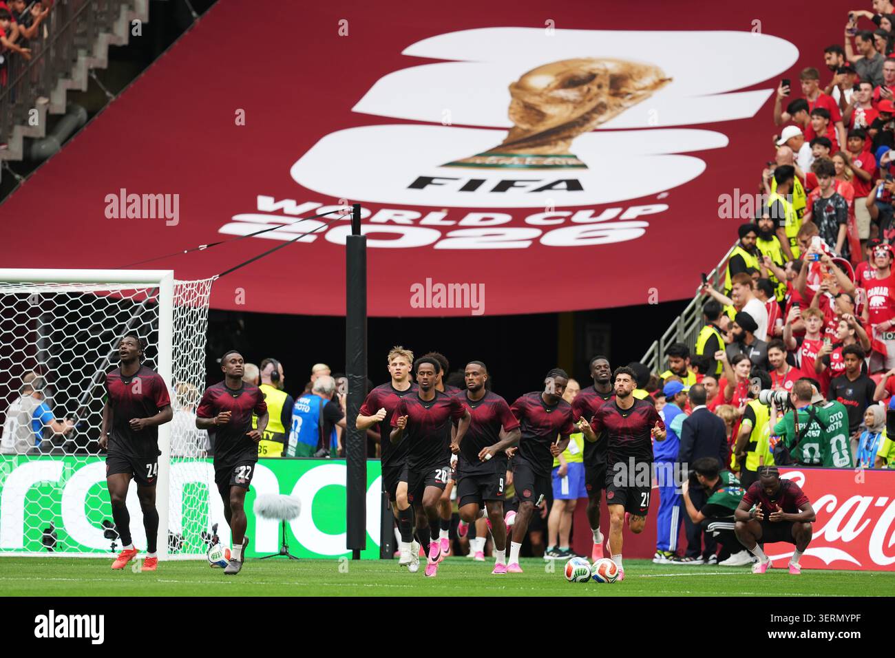 Canada takes the field for warm up prior to a World Cup Group B soccer ...