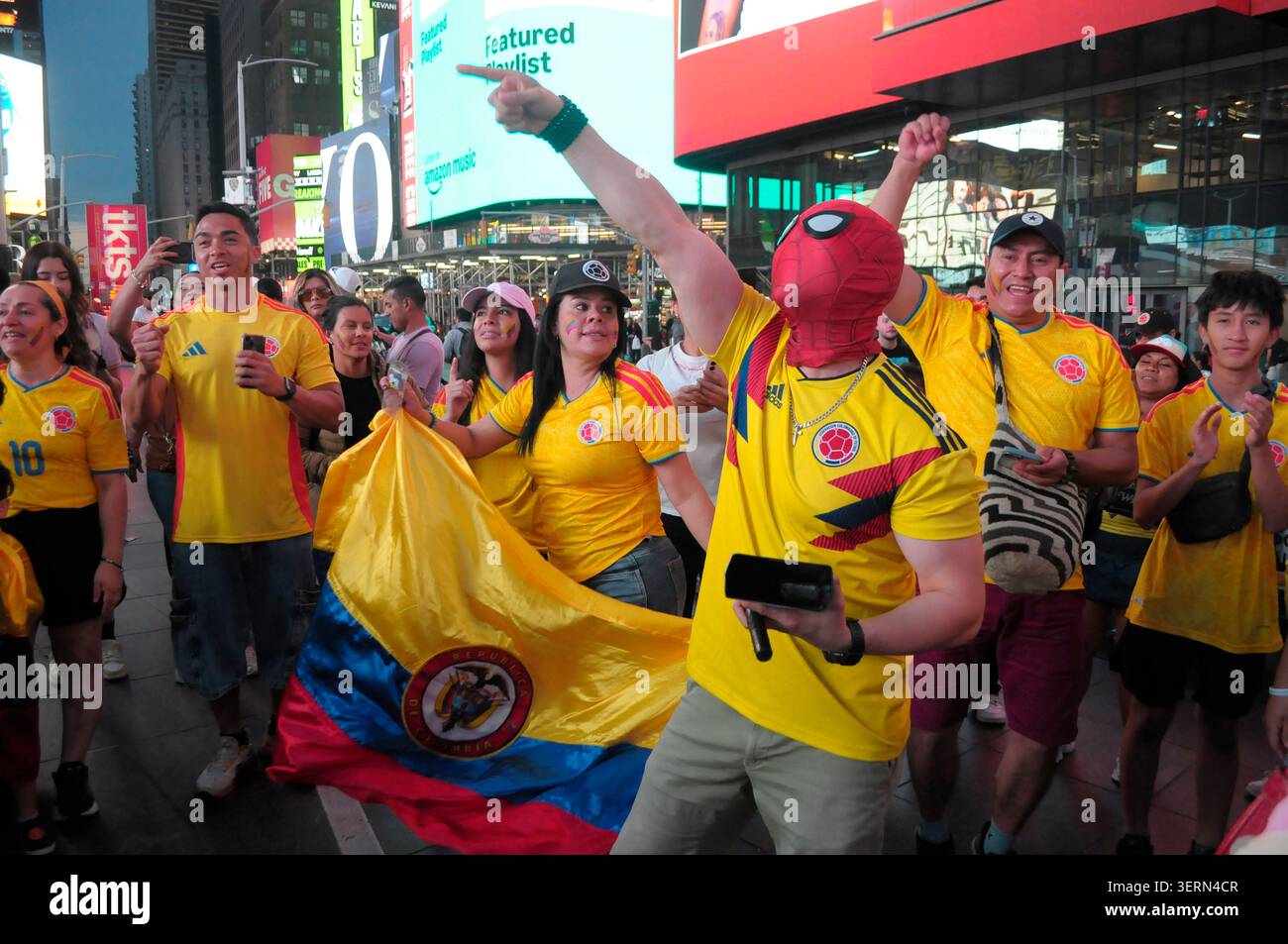 A fan of the Colombian national soccer team wears a Spiderman mask in ...