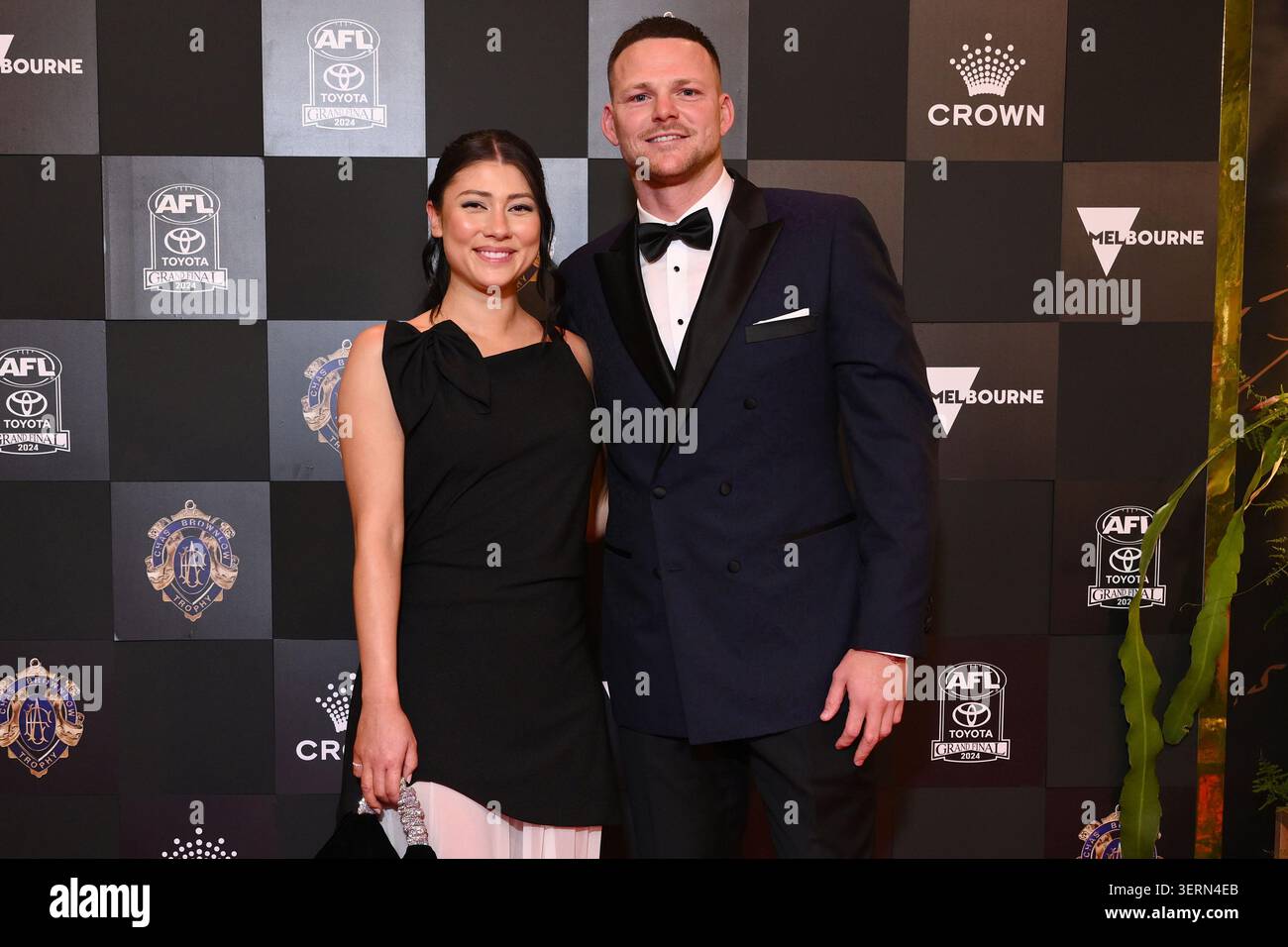 (File) Steven May of Melbourne with partner Sachi Dade on the red ...
