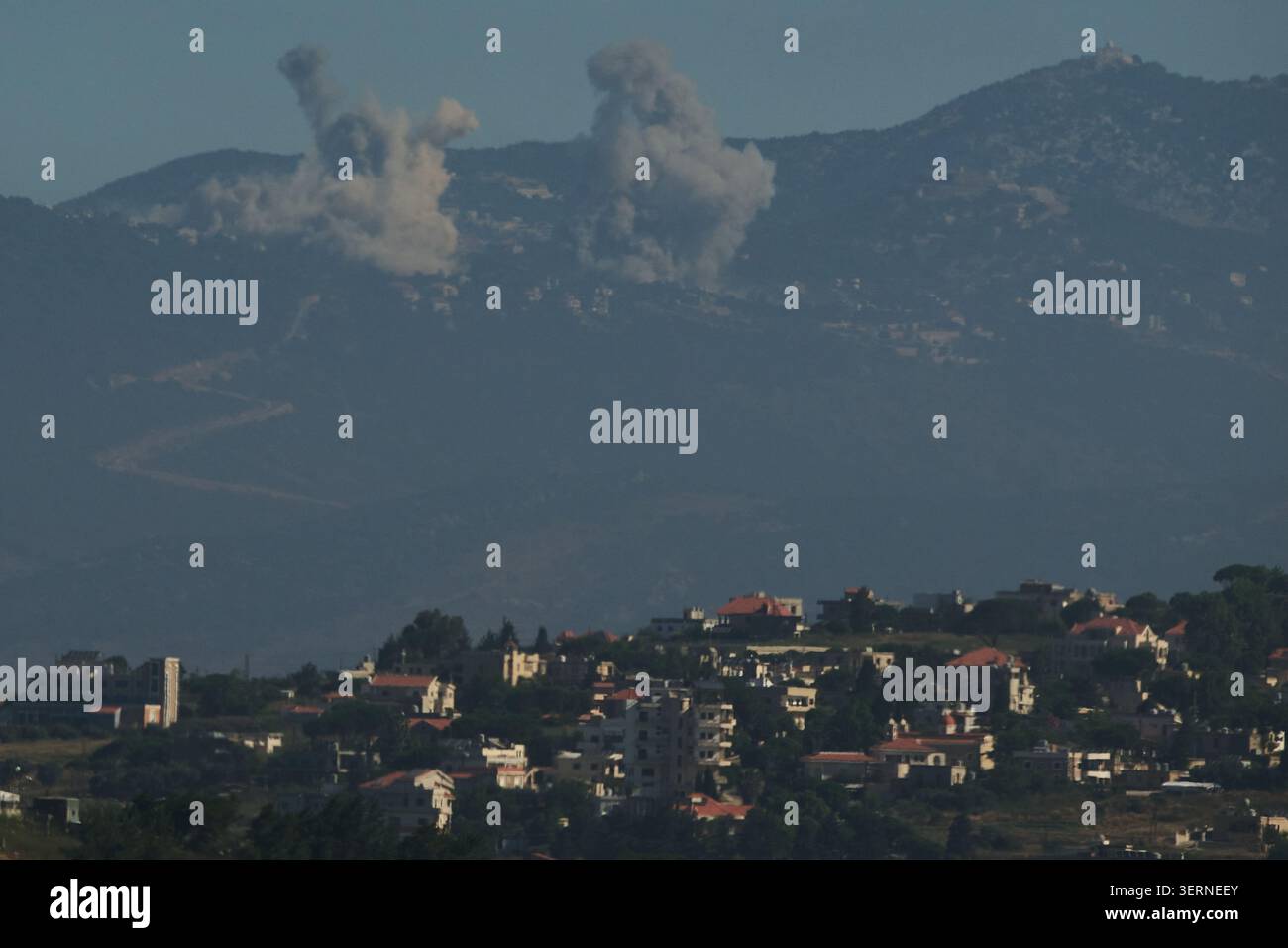 Smokes rise to the sky following an Israeli military strike in southern ...
