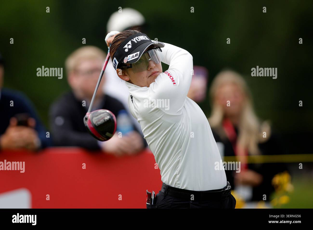 Chizzy Iwai, of Japan, watches her tee shot on the ninth hole during ...