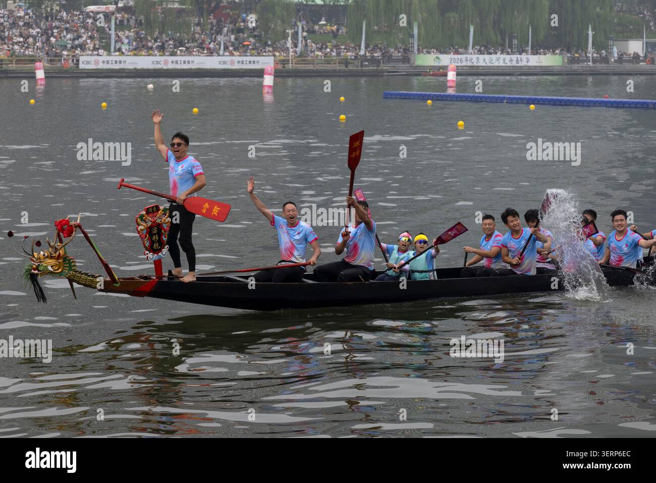 Performers cheer after a demonstration ahead of Dragon Boat Races to ...