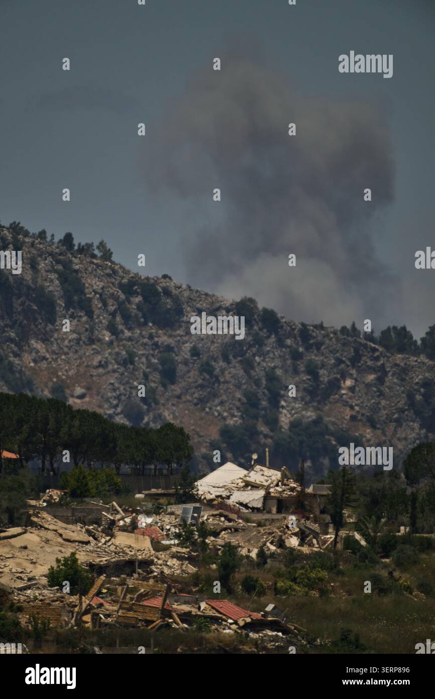Smoke rises to the sky following an Israeli military strike in southern ...