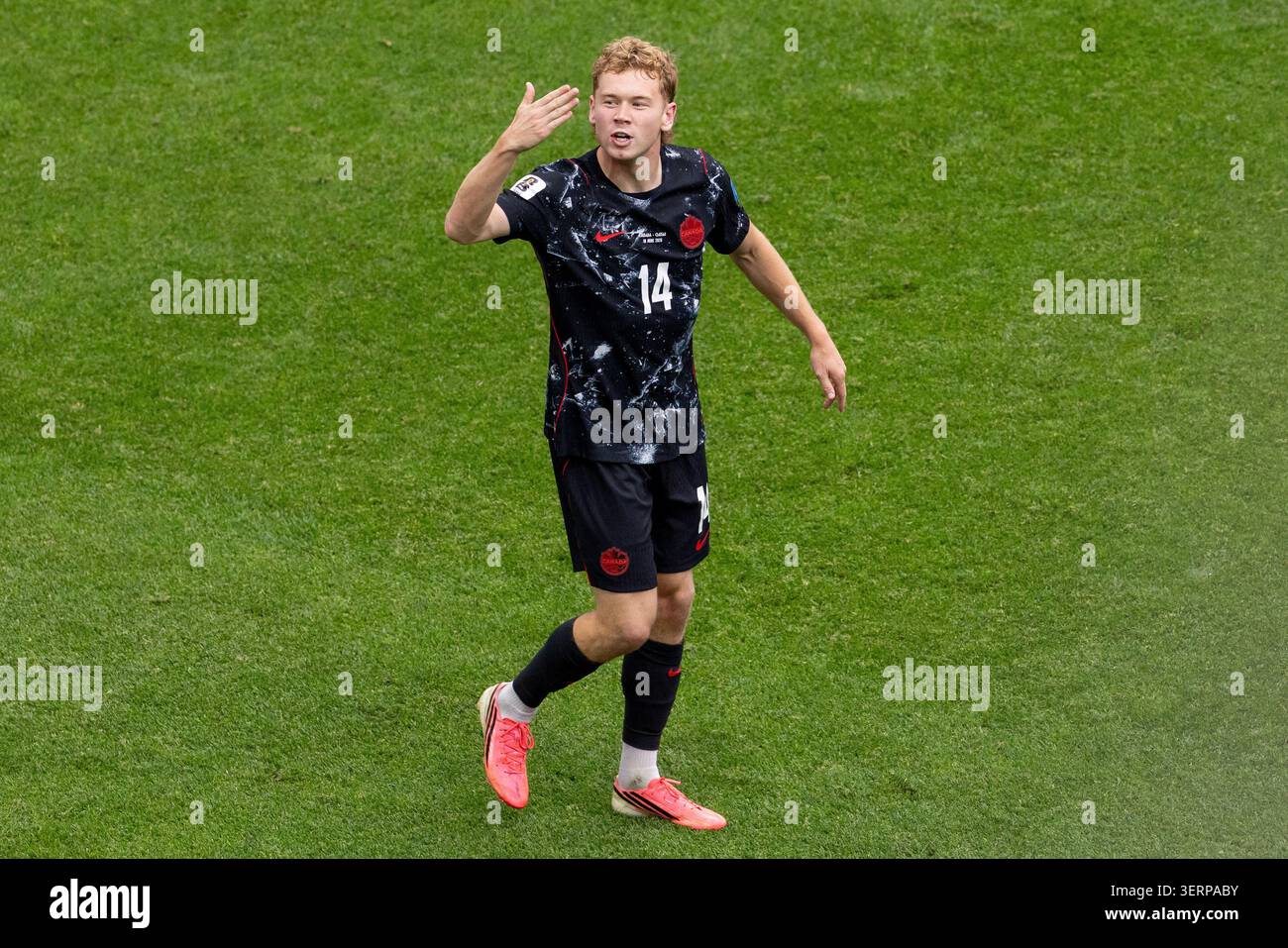 Canada's Jacob Shaffelburg (14) celebrates after his goal against Qatar ...