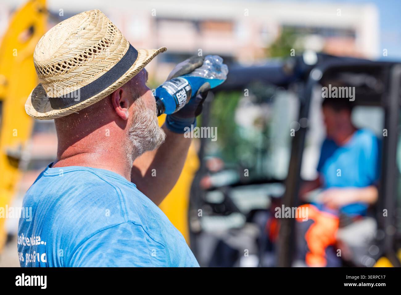 19 June 2026, Brandenburg, Cottbus: A worker from a civil engineering ...