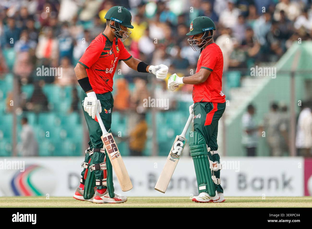 Bangladesh's Tanzid Hasan Tamim and Saif Hassan toss during the second ...