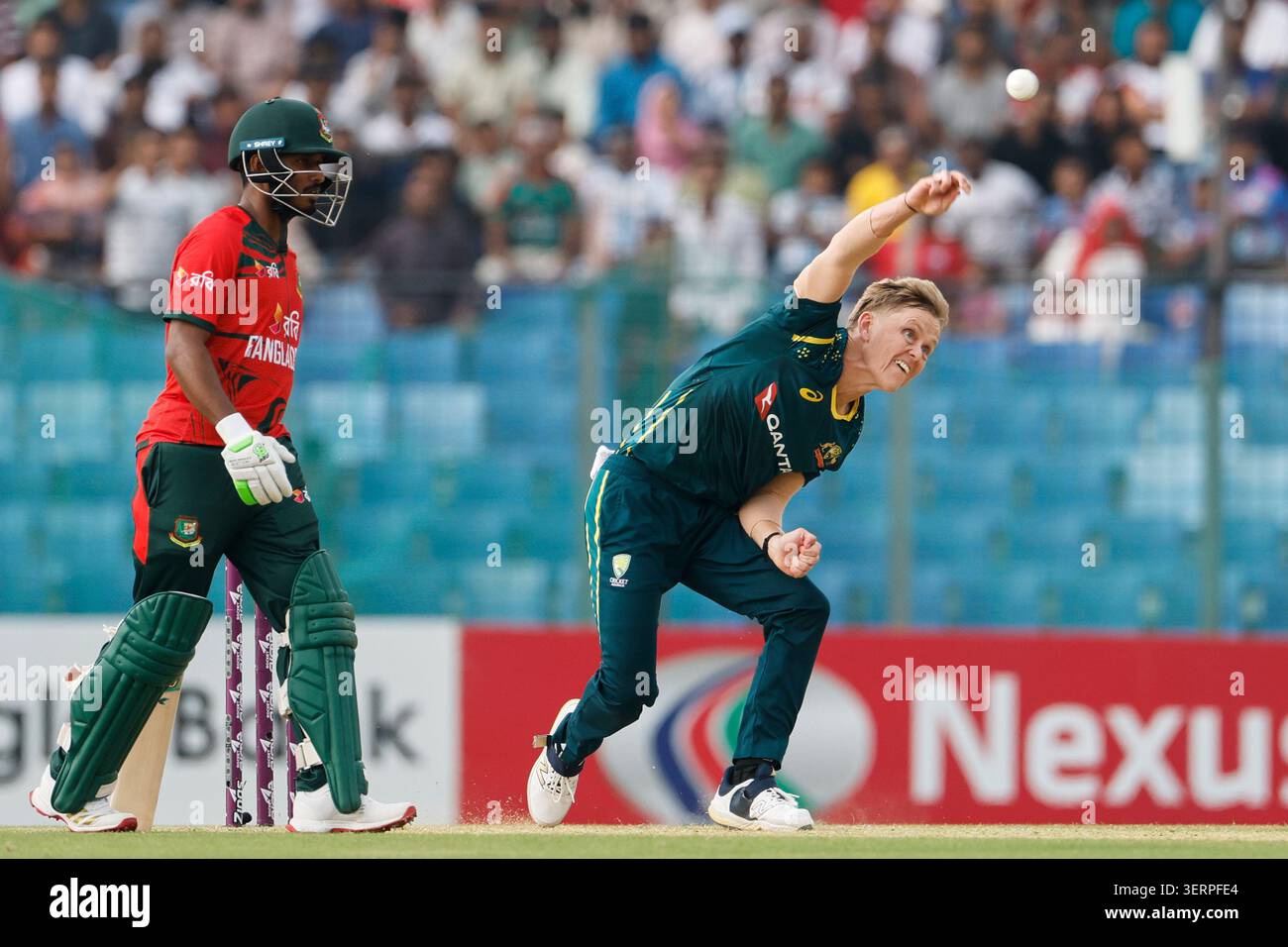 Australia's Nathan Ellis bowls a delivery during the second T20 ...