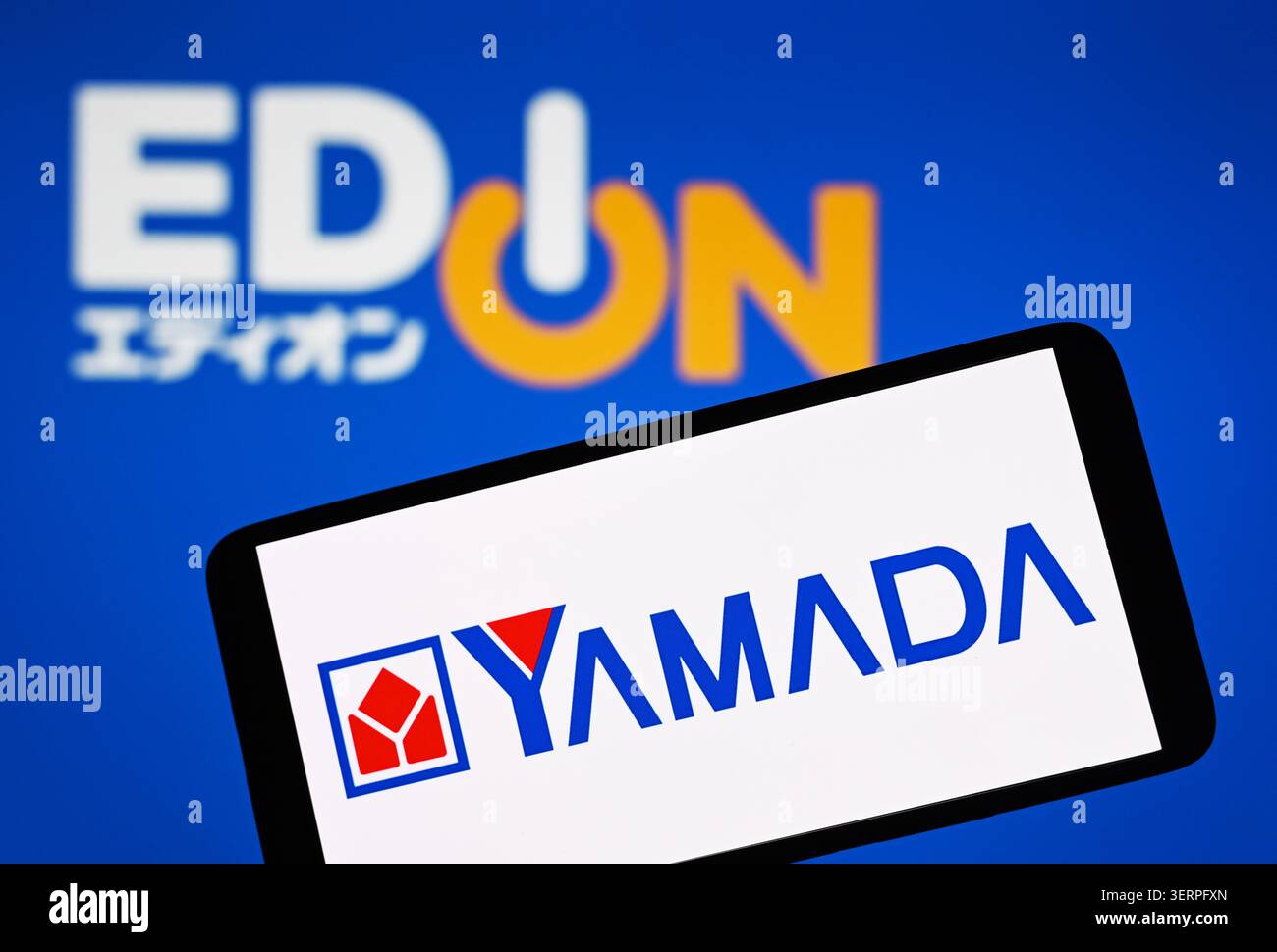 In this photo illustration, the Yamada Holdings logo is seen displayed ...