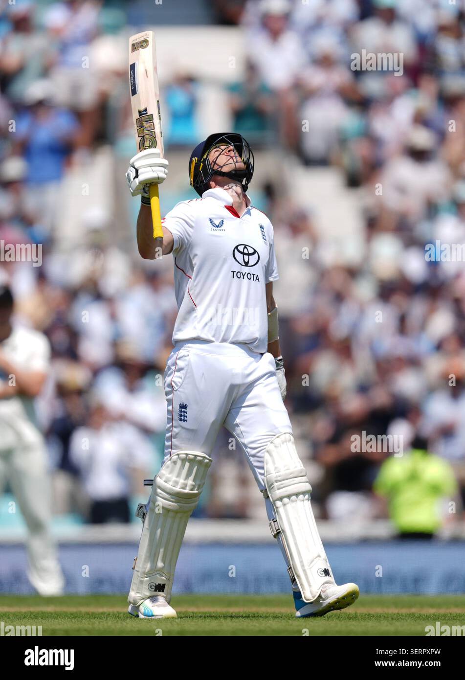 England's Matt Fisher celebrates reaching 50 runs on day three of the ...