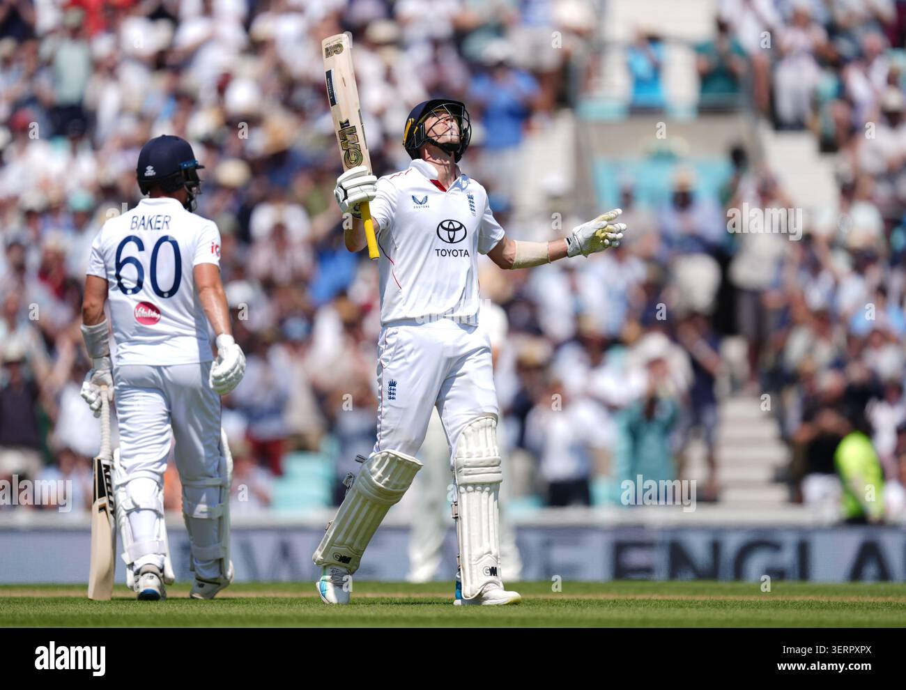 England's Matt Fisher celebrates reaching 50 runs on day three of the ...