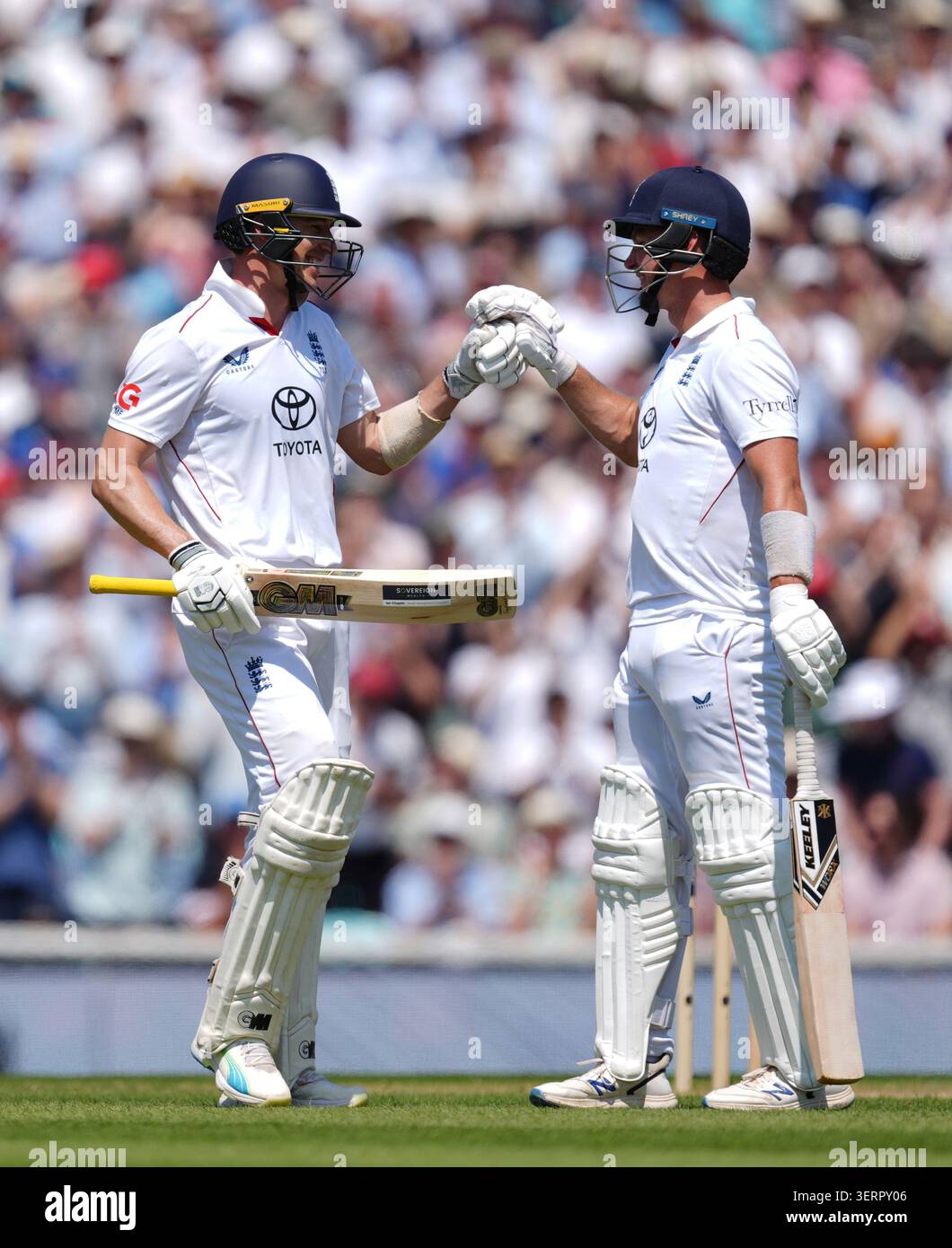 England's Matt Fisher (left) celebrates with batting partner Sonny ...