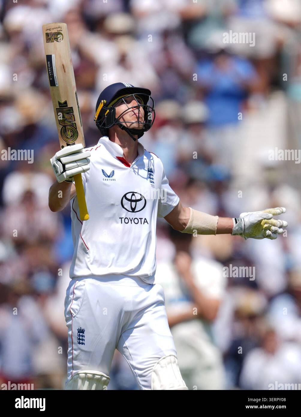 England's Matt Fisher celebrates reaching 50 runs on day three of the ...
