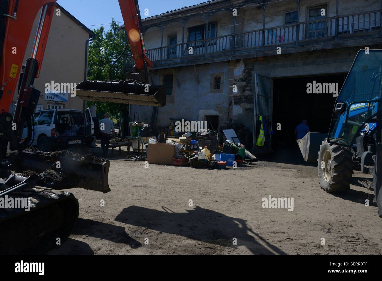 An excavator is helping with the clean-up efforts on 19 June 2026 in ...
