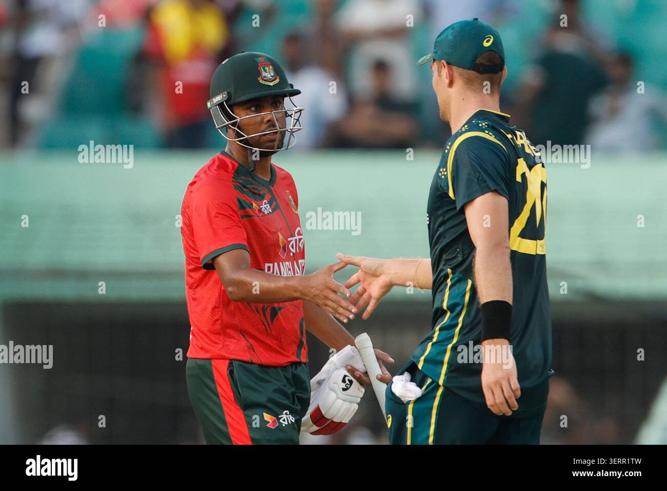 Bangladesh's Abdul Gaffar Saqlain, congratulates Australia's Aaron ...