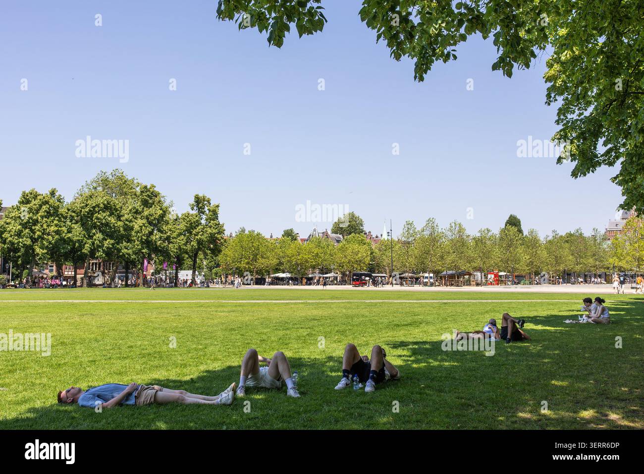 AMSTERDAM - Museumplein. People seek shade in Amsterdam's city center ...