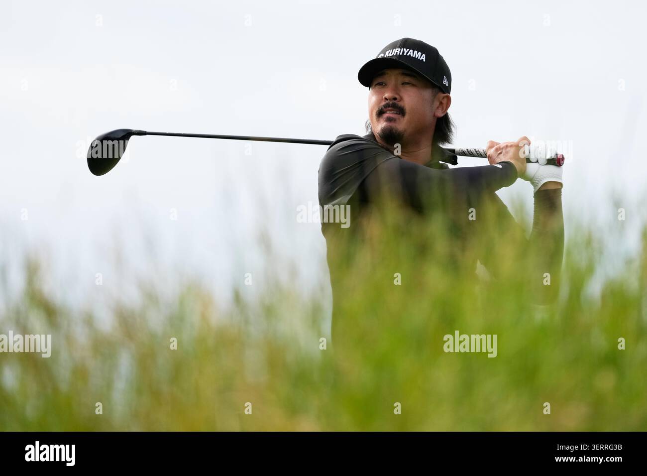 Taihei Sato watches his tee shot on the 12th hole during the second ...