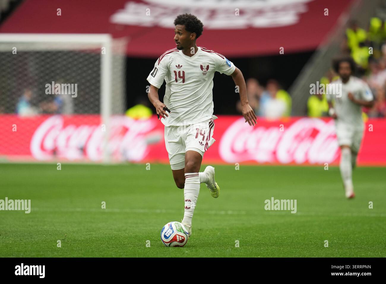 Qatar's Homam Ahmed controls the ball during the World Cup Group B ...