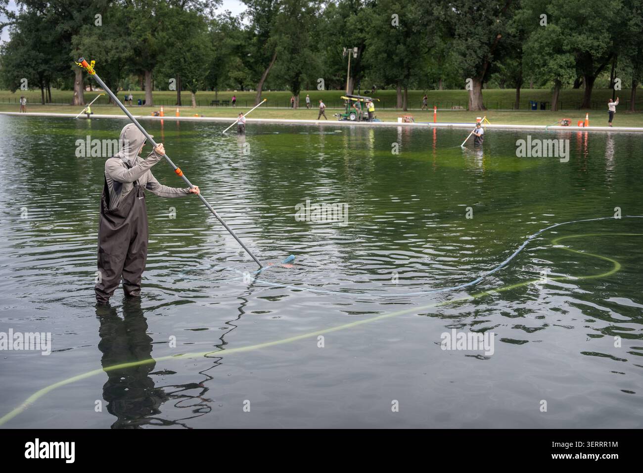 National Park Service employees use vacuums to clean the Lincoln ...