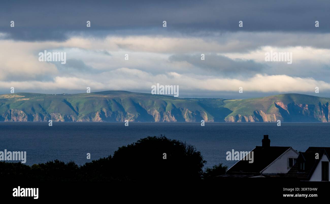 Exmoor's north coast at dawn from across the Bristol Chanell at Mumbles ...