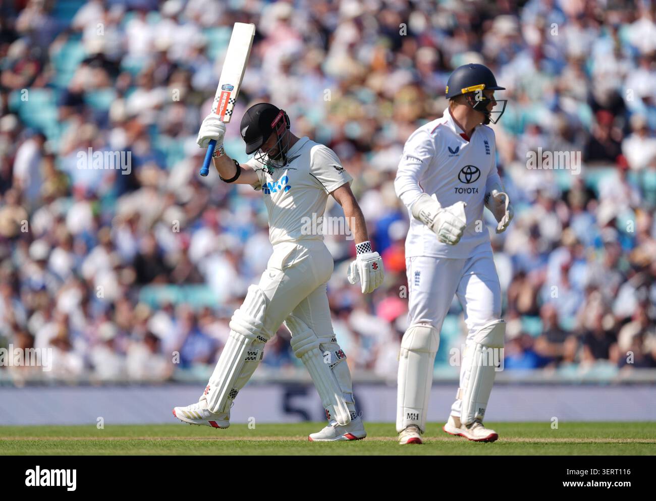 New Zealand's Henry Nicholls celebrates reaching 50 runs on day three ...