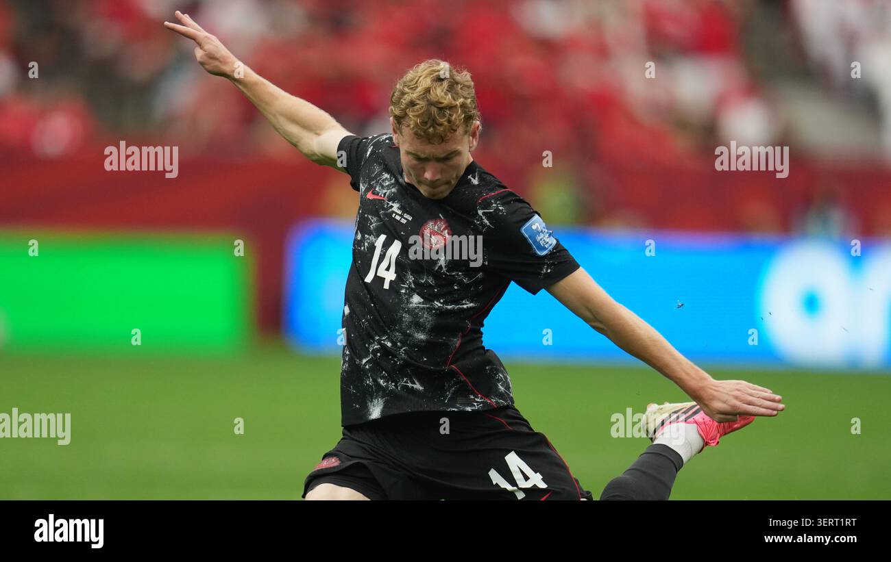 Canada's Jacob Shaffelburg (14) kicks the ball during the World Cup ...
