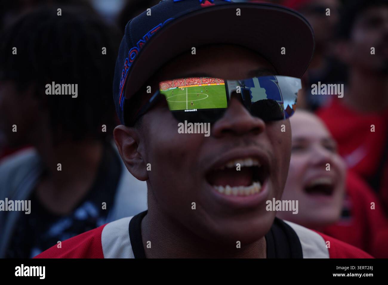 Alan Neckles, 18, cheers for the Canadian team at the FIFA Fan Festival ...