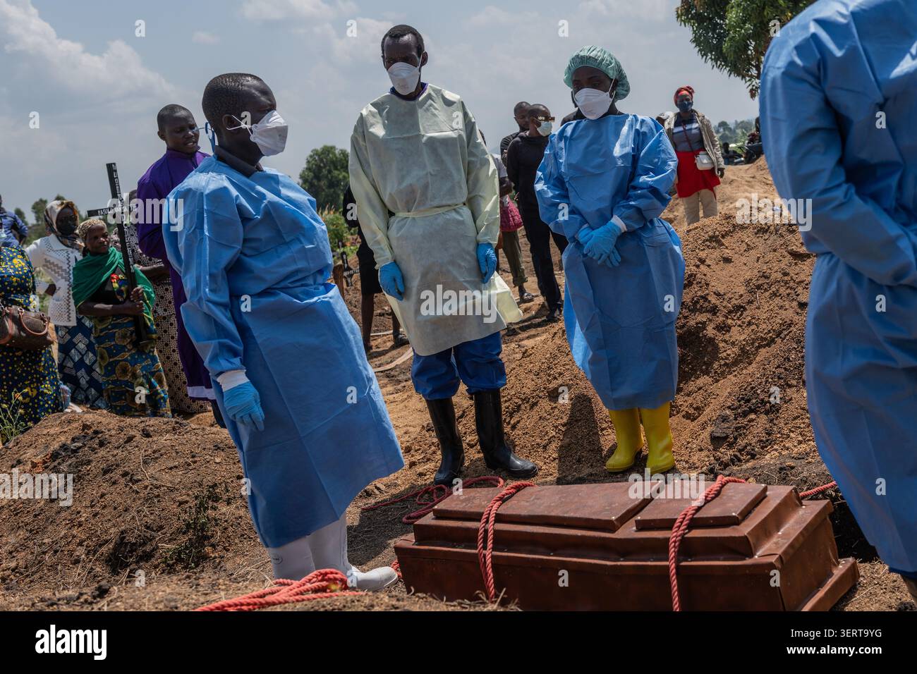 Red Cross workers prepare to bury Vanisa Anifa, a 6-month-old orphaned ...