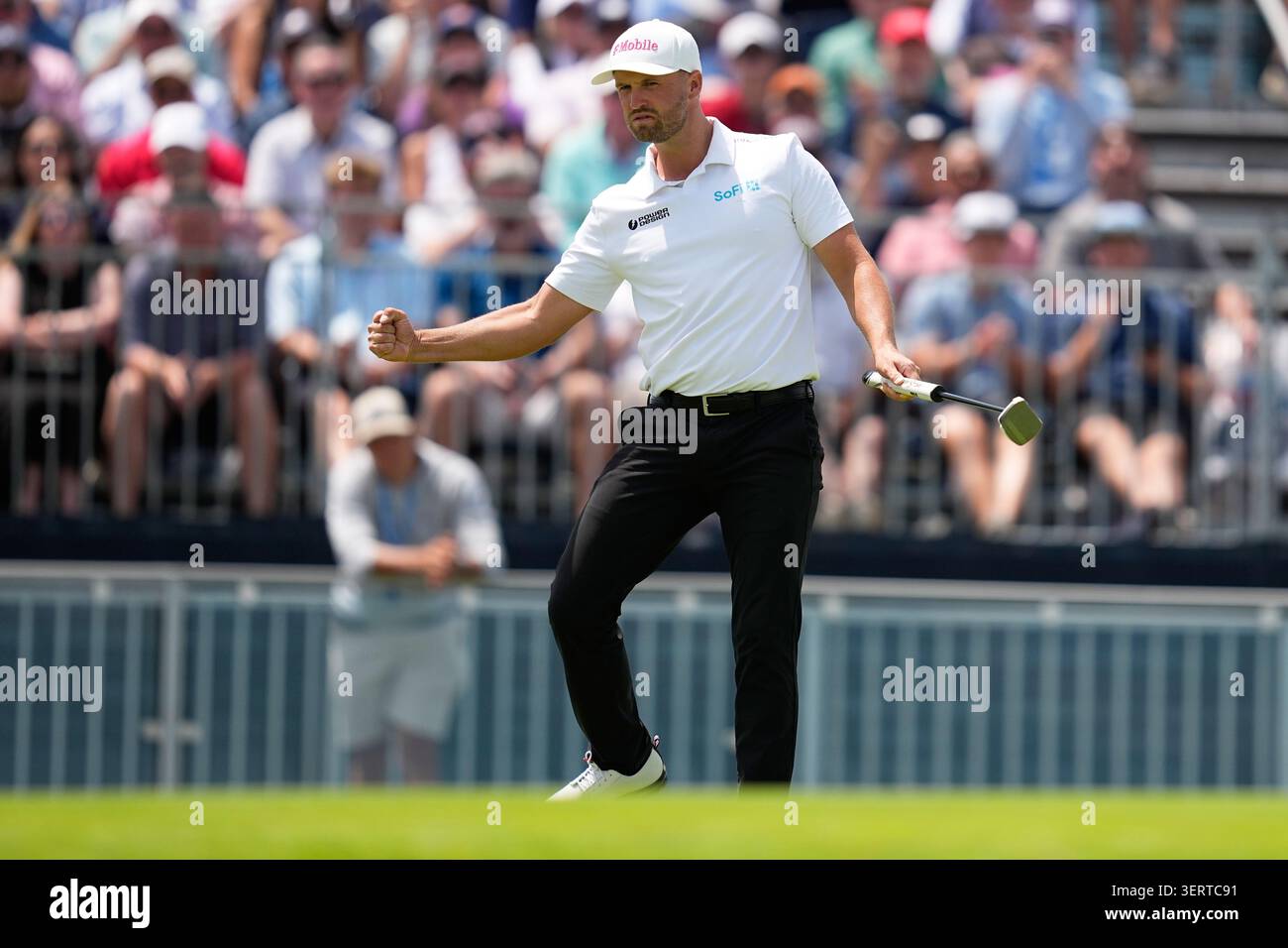 Wyndham Clark celebrates after a birdie on the 12th hole during the ...
