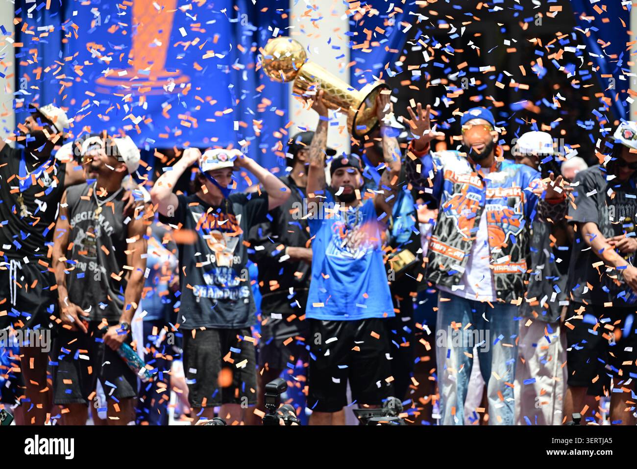Confetti is flying in the air as players party at the rally celebrating ...