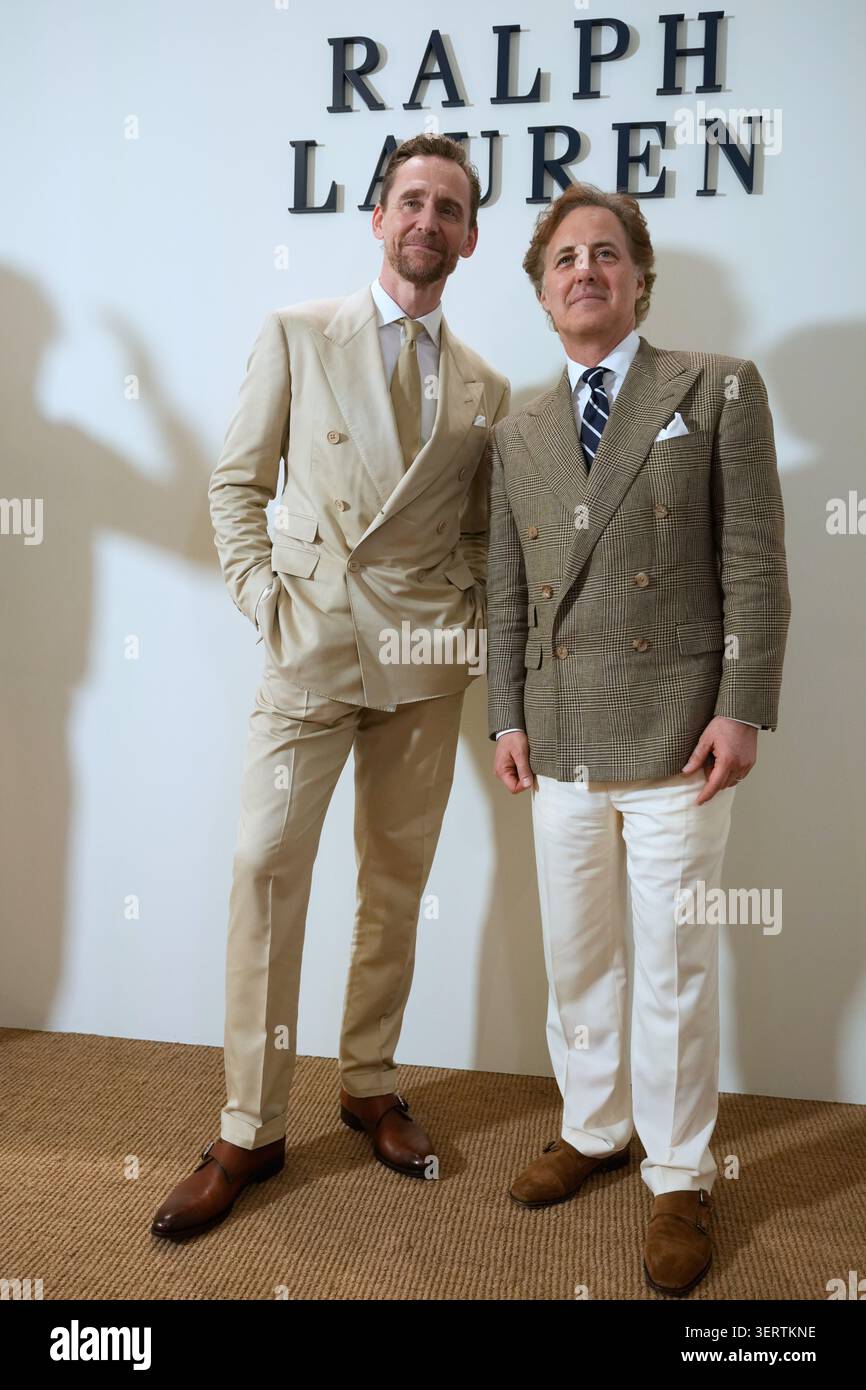 Tom Hiddleston, left, and David Lauren pose before the start of the ...