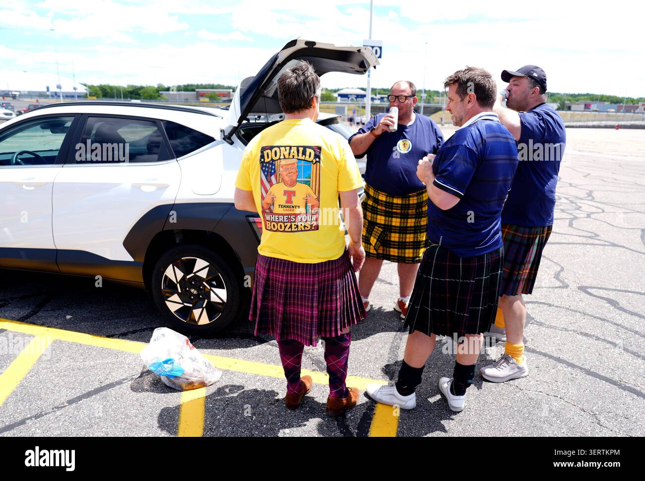 Scotland fans sporting a Donald Trump themed shirt ahead of the FIFA ...