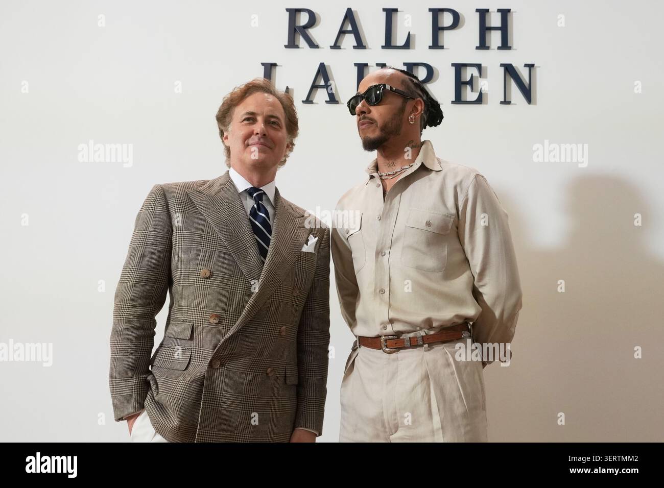 Lewis Hamilton and David Lauren pose before the presentation of the ...