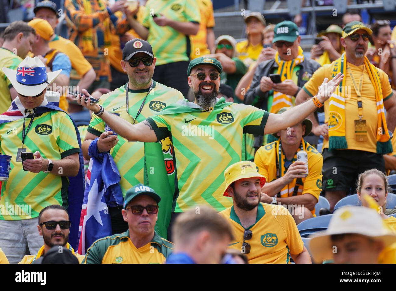 Australian fans wait for the World Cup Group D soccer match between the ...