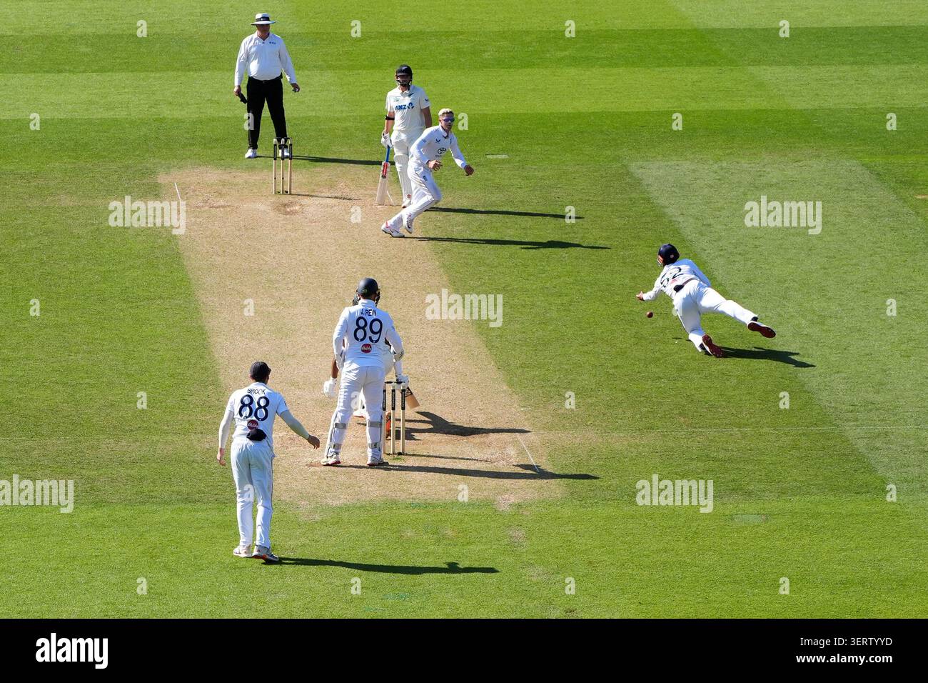 England's Emilio Gay drops a catch off the bat of New Zealand's Rachin ...