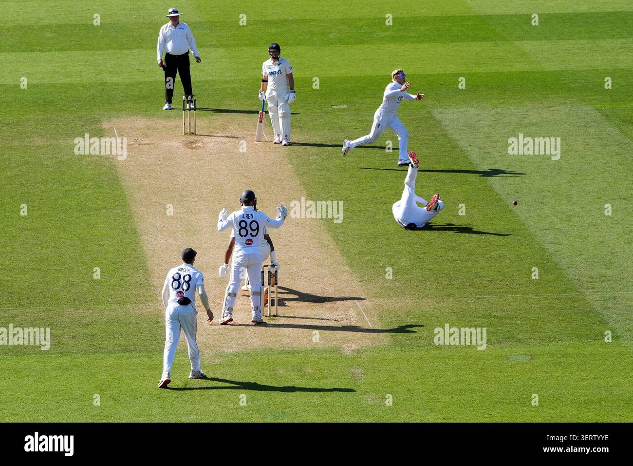 England's Emilio Gay drops a catch off the bat of New Zealand's Rachin ...