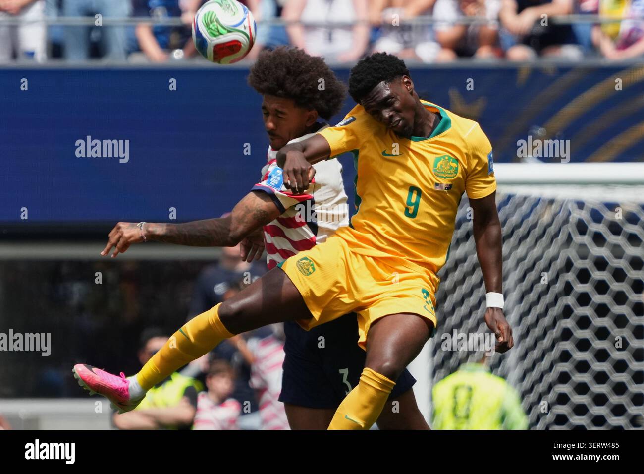 United States' Chris Richards (3) and Australia's Mohamed Toure (9 ...