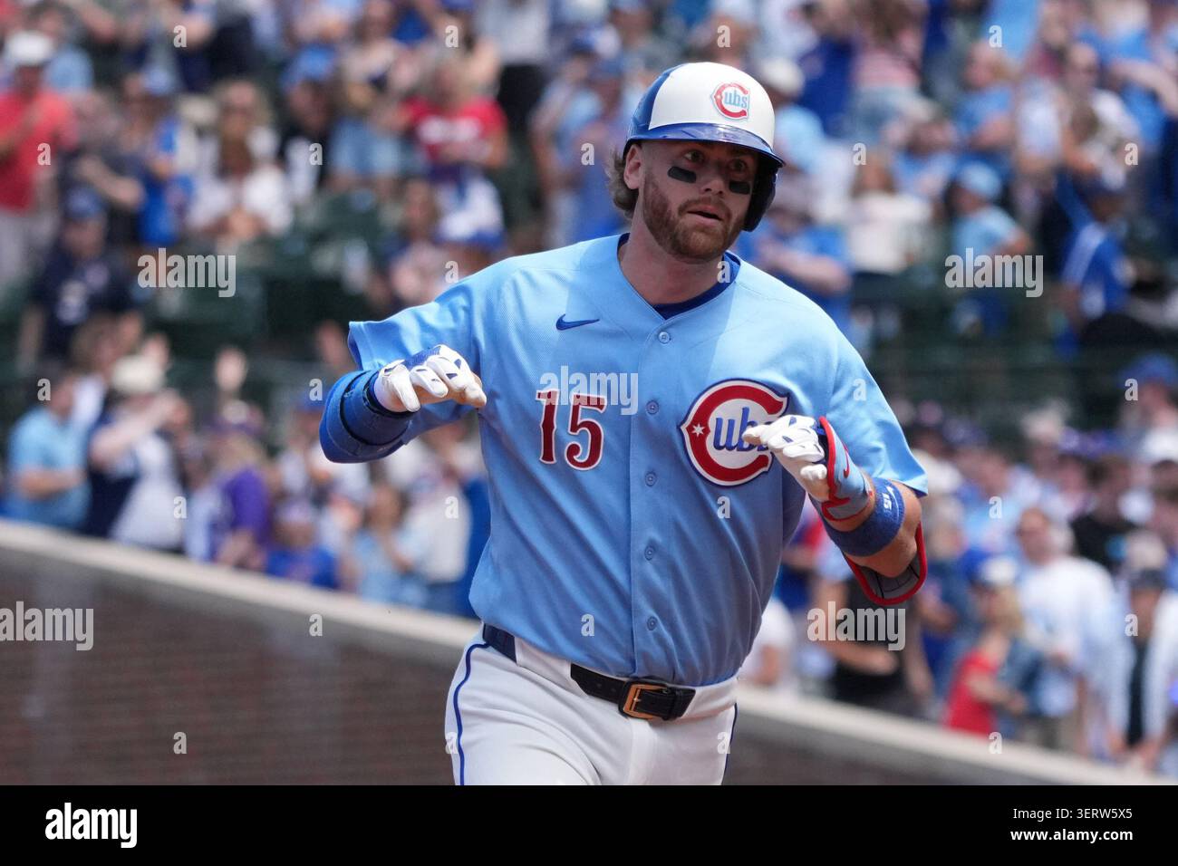 Chicago Cubs' Carson Kelly gestures after hitting a grand slam home run ...