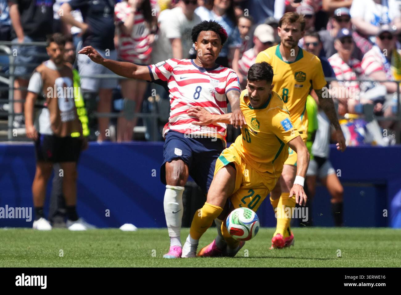United States' Weston McKennie (8) tackles Australia's Cristian Volpato ...
