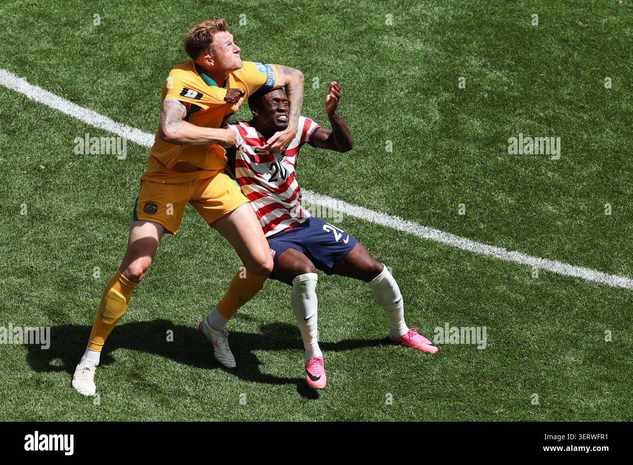 Australia's Harry Souttar (19) and United States' Folarin Balogun (20 ...