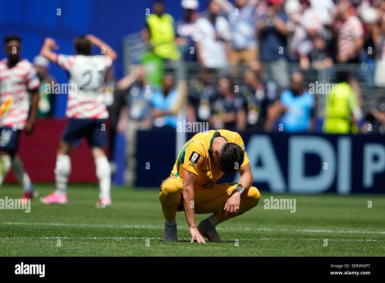Australia's Cristian Volpato reacts at the end of the World Cup Group D ...