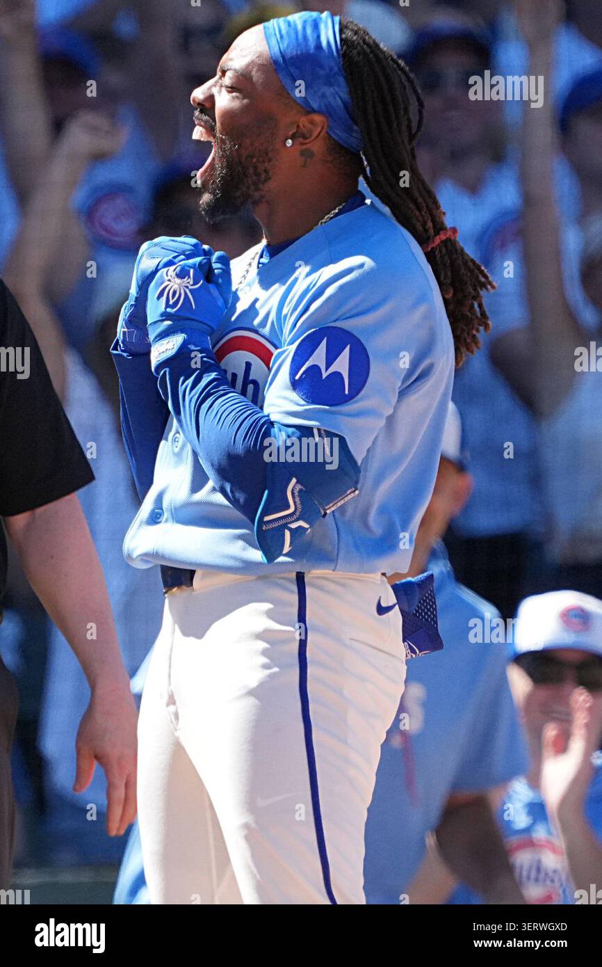 Chicago Cubs' Justin Dean reacts after hitting a three-run triple ...