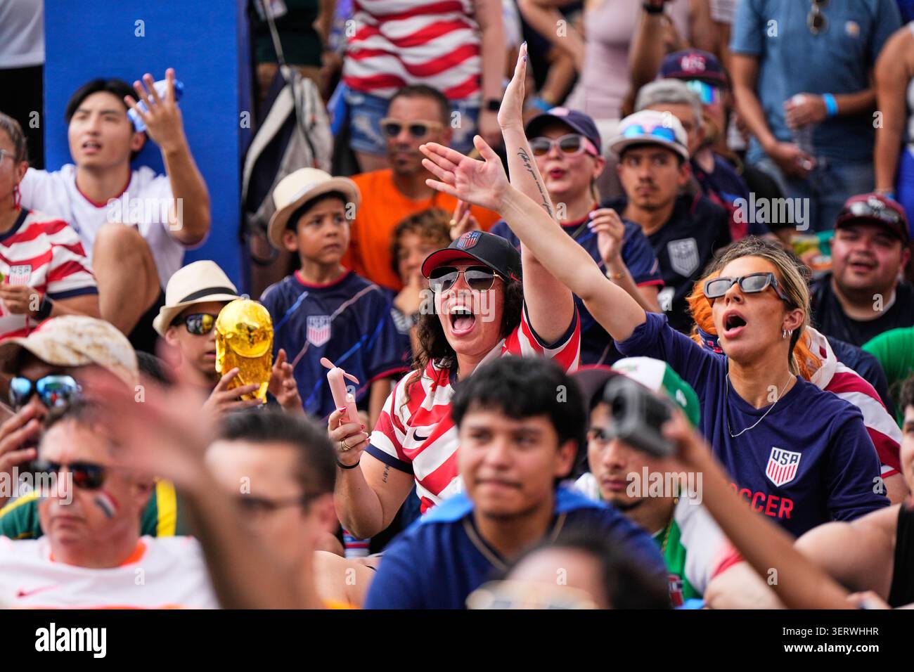 People in Houston react during a live broadcast of a World Cup Group D ...