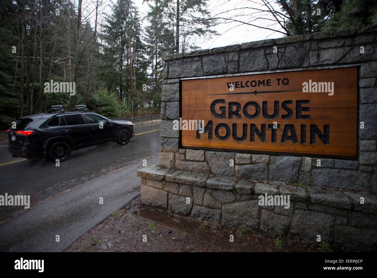 A car drives up the mountain to Grouse Mountain in North Vancouver, B.C ...